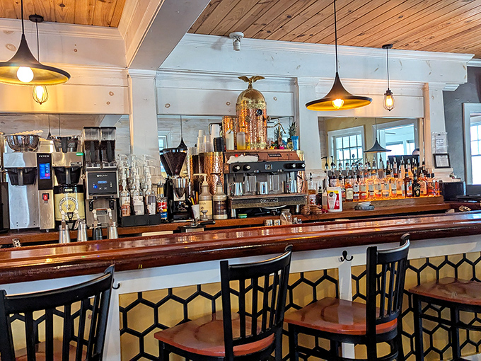 The bar area whispers "stay awhile" with its honeycomb details and warm wood. Even teetotalers will find themselves drawn to these stools.
