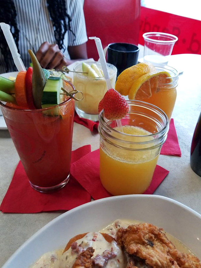 Brunch cocktails lined up like liquid joy&mdash;each one garnished with care and promising a most delightful morning adventure.