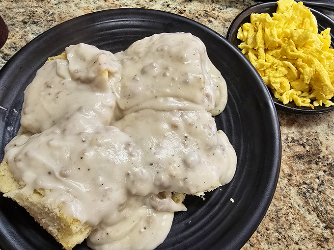 Biscuits and gravy that would make your Southern grandmother weep with joy. Creamy, peppery perfection that demands to be savored slowly.