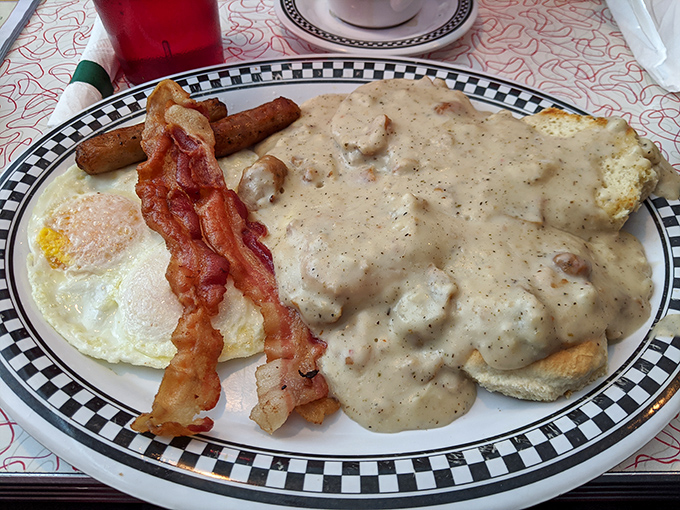 Biscuits and gravy with a side of everything good in this world&mdash;eggs, bacon, and sausage links forming a breakfast alliance that's impossible to resist.