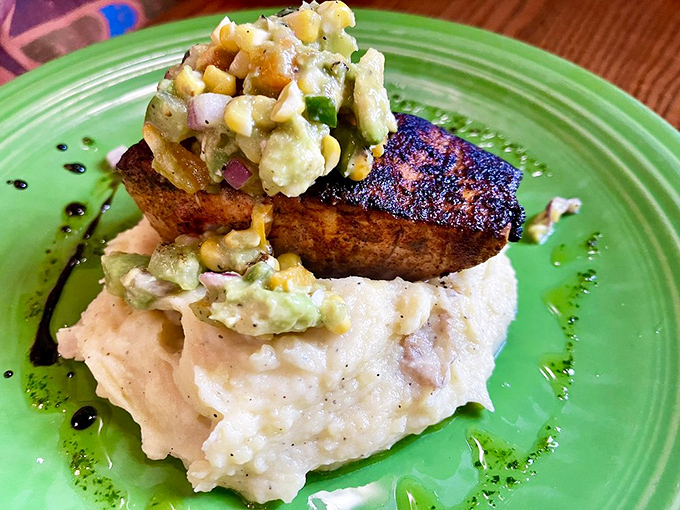 Blackened seasoning meets creamy starch in a dish that says, "Yes, the beach is beautiful, but have you tried THIS?"