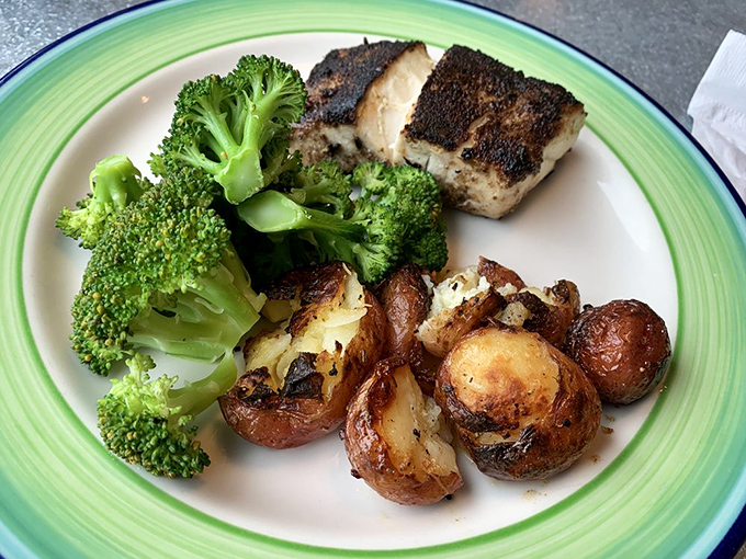 Blackened fish that's been kissed by fire, not burned by it. The perfect balance of bold spice and delicate seafood.