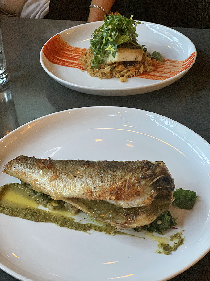This branzino isn't just a fish&mdash;it's a Mediterranean vacation on a plate. The skin is crisped to perfection, like it spent the afternoon sunbathing.