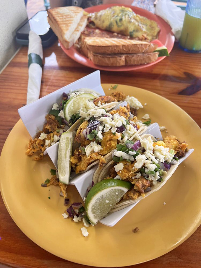 These breakfast tacos are dressed better than most people on vacation &ndash; adorned with fresh lime, crumbled cheese, and a sprinkle of hope.