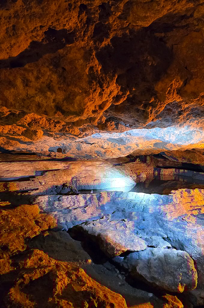 Reflective pools mirror the cave's ceiling, doubling the wonder. It's nature's way of showing off its best angles.