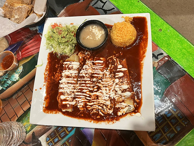This tostada isn't just topped—it's architected. Layer upon layer of freshness creating a crunchy, creamy masterpiece of Mexican engineering.