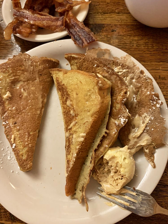 Cinnamon French toast triangles with a generous scoop of butter. The architectural approach to breakfast that would make Frank Lloyd Wright proud.