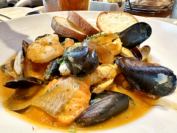 A symphony of shellfish in savory broth—this seafood medley is what mermaids would serve at their dinner parties.