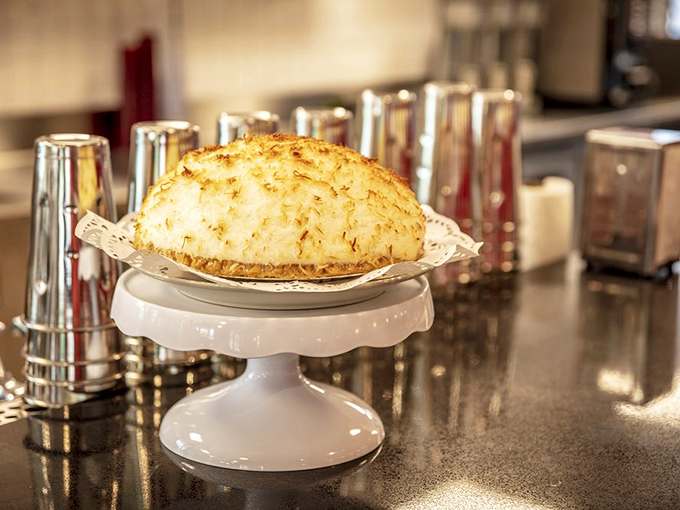 Coconut meringue pie that would make your grandmother both jealous and proud. Cloud-like peaks hiding creamy treasure below.