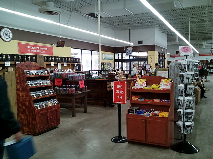 The checkout area, where dreams and credit cards meet reality. That "Line Starts Here" sign has witnessed countless "I can't believe I found this!" moments.