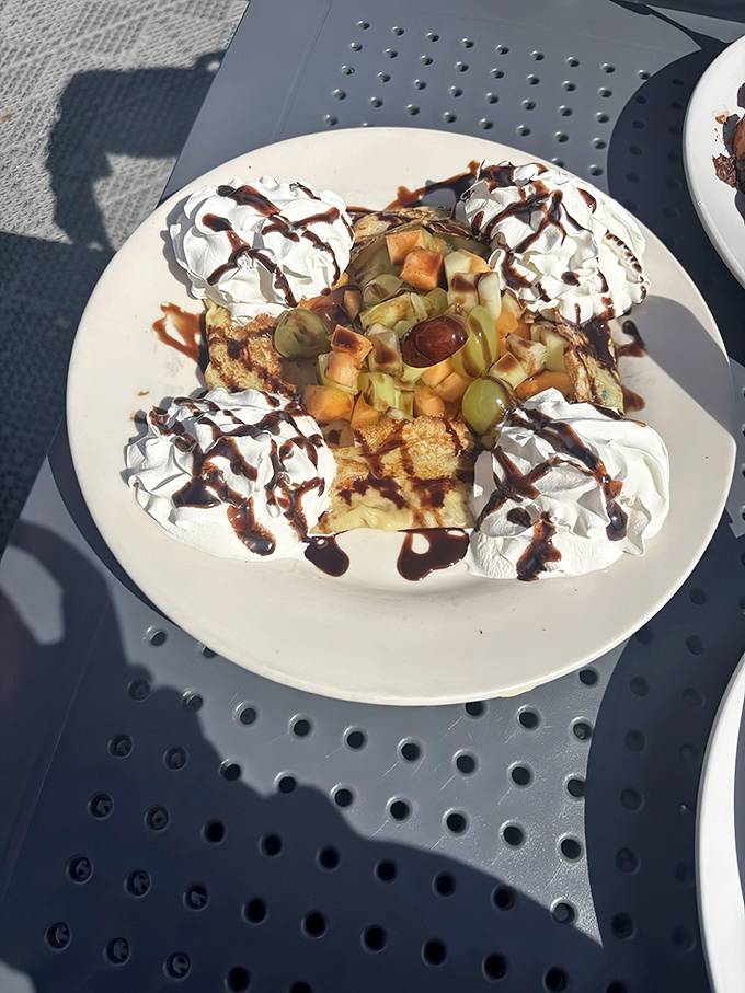 The Crepe Delight lives up to its name with fresh fruit, whipped cream, and chocolate drizzle&mdash;dessert masquerading as breakfast, and we're not complaining.
