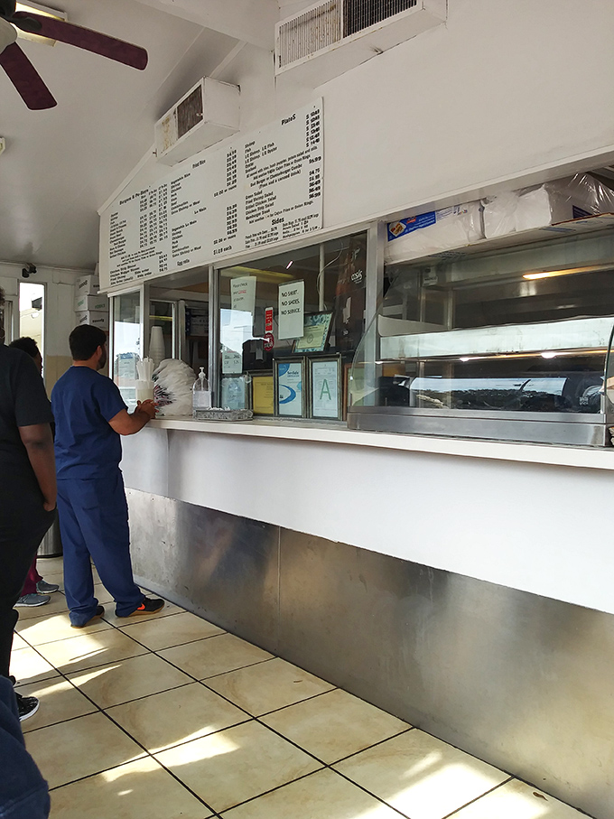 The universal language of good food: customers patiently waiting their turn, knowing that some things in life are absolutely worth the wait.