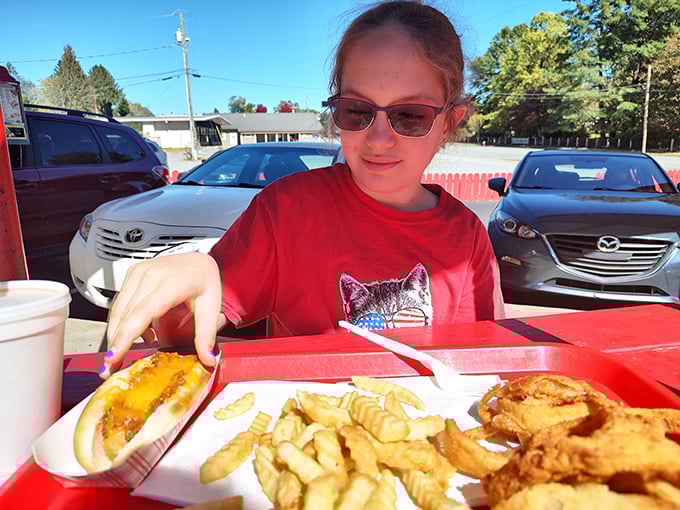 The joy of simple pleasures captured in a single frame&mdash;sunshine, comfort food, and the kind of outdoor dining that makes memories.