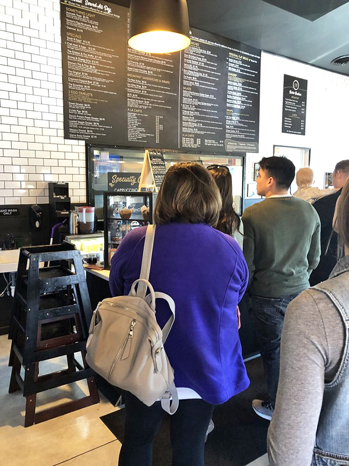 The universal language of anticipation: standing in line for exceptional food. These customers know good things come to those who wait.