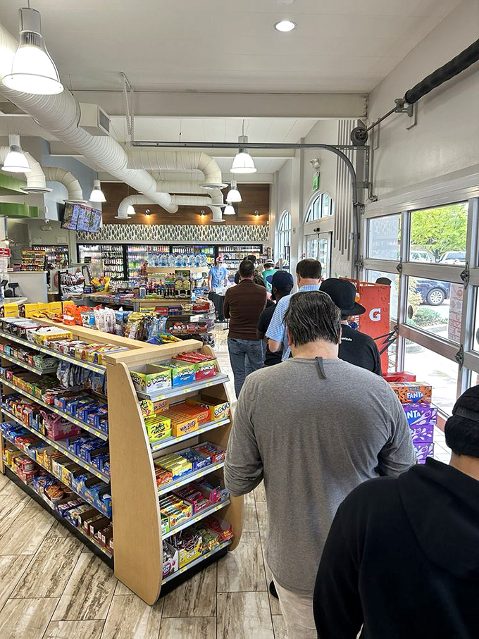 The line of pilgrims waiting for burger salvation. That guy in the gray shirt knows he's about to have a religious experience.