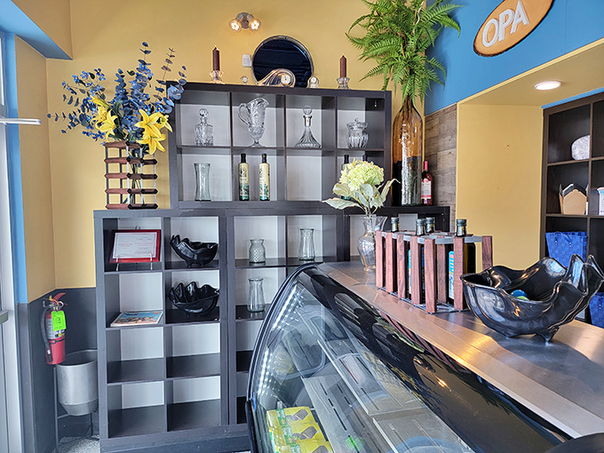 The shelves aren't just d&eacute;cor&mdash;they're a gallery exhibition of Greek hospitality, where every vase and bottle tells a Mediterranean story.