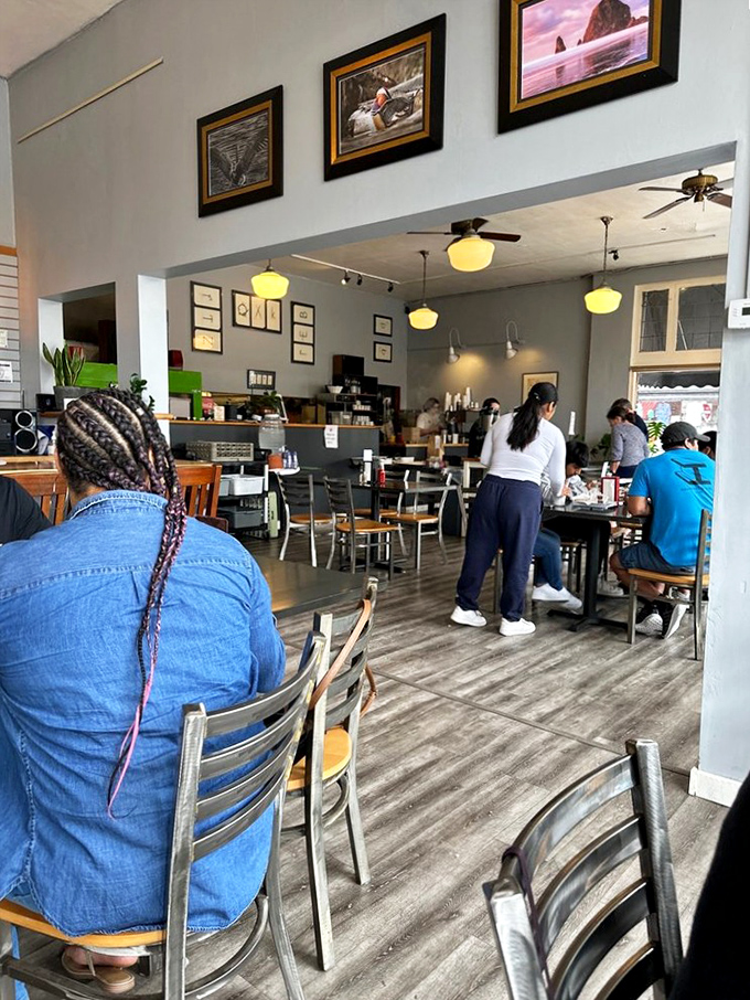 The dining room hums with the universal language of "mmm" as patrons discover why Portland keeps this waffle spot packed.