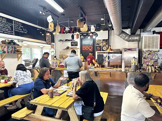 The communal dining experience at 2Fifty creates a temporary family of strangers united by their appreciation for properly smoked meat.