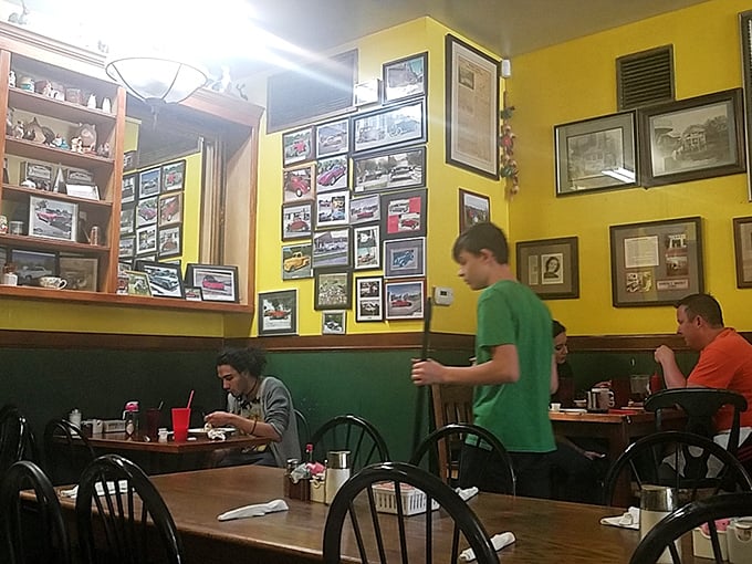 Yellow walls adorned with memories and memorabilia. Every table holds the possibility of becoming someone's favorite breakfast spot.