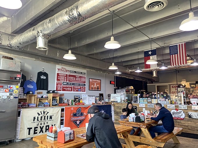 Picnic tables, Texas flags, and walls covered in memorabilia create the perfect backdrop for the serious business of barbecue consumption.