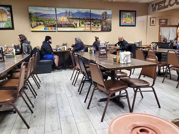 The dining room hums with conversation and satisfaction. Those murals transport you straight to Mexico between bites.