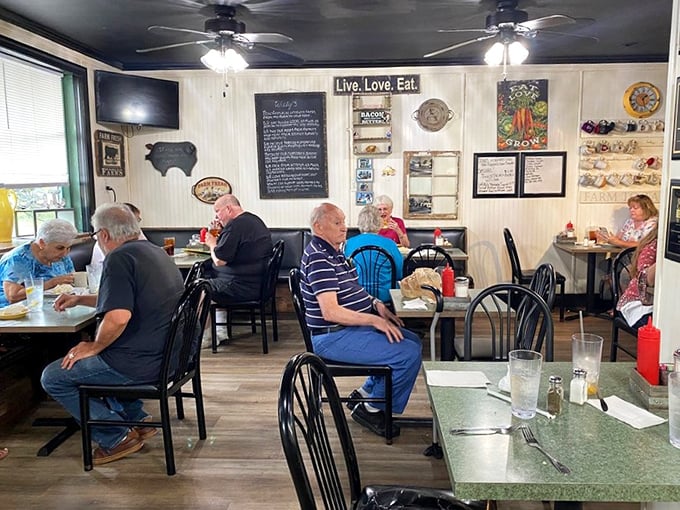 The true measure of a great local spot: regulars who've been claiming the same tables since before smartphones existed, trading newspaper sections instead of Instagram handles.