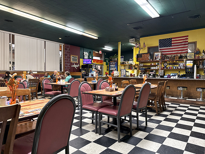 Classic diner seating with that iconic checkered floor. Where strangers become regulars and regulars become family over bottomless coffee.