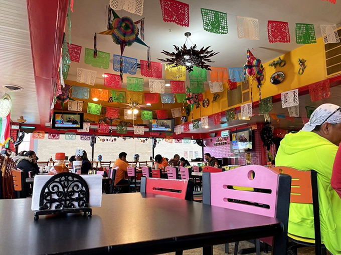 The colorful d&eacute;cor includes vintage photos and playful elements. Like walking into your most interesting friend's living room&mdash;if they served amazing tacos.