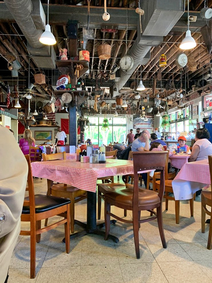 Red-checkered tablecloths and a ceiling full of conversation pieces create the perfect setting for a meal where strangers often become friends over biscuits and gravy.