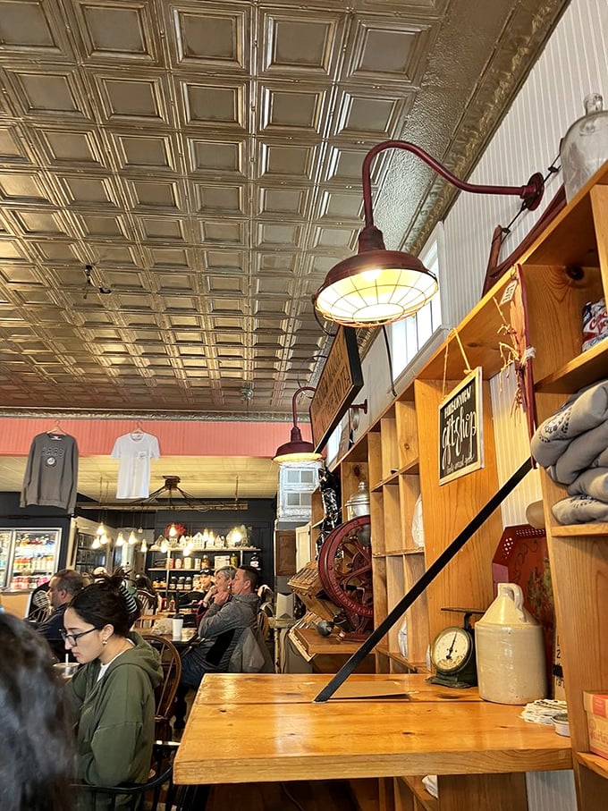 Wooden tables that have hosted more meaningful conversations than most therapists' offices. The coffee refills keep the revelations flowing. 
