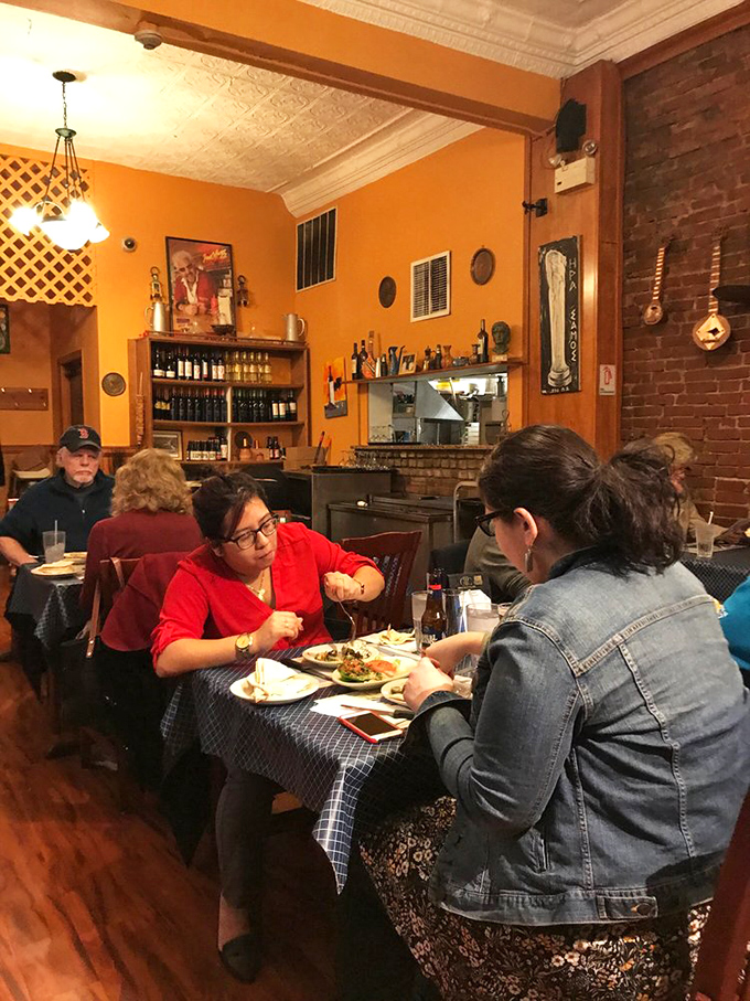 The warm glow of Greek Corner's dining room creates the perfect backdrop for what truly matters: good food and better company.