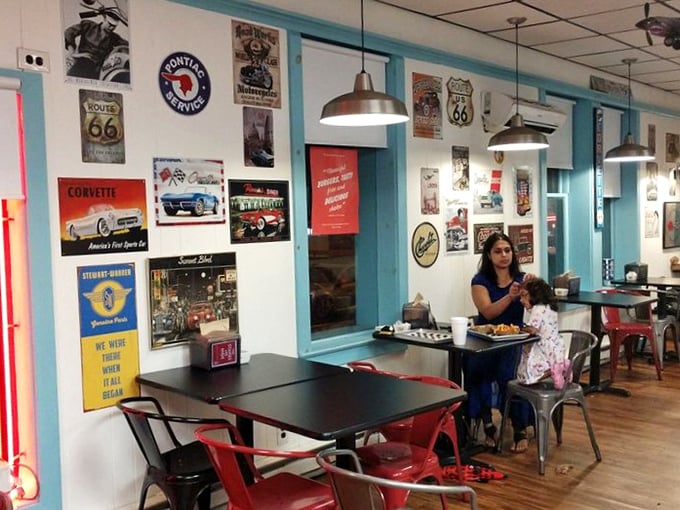 Blue-trimmed walls lined with automotive memorabilia create the perfect environment for making new memories over comfort food classics.