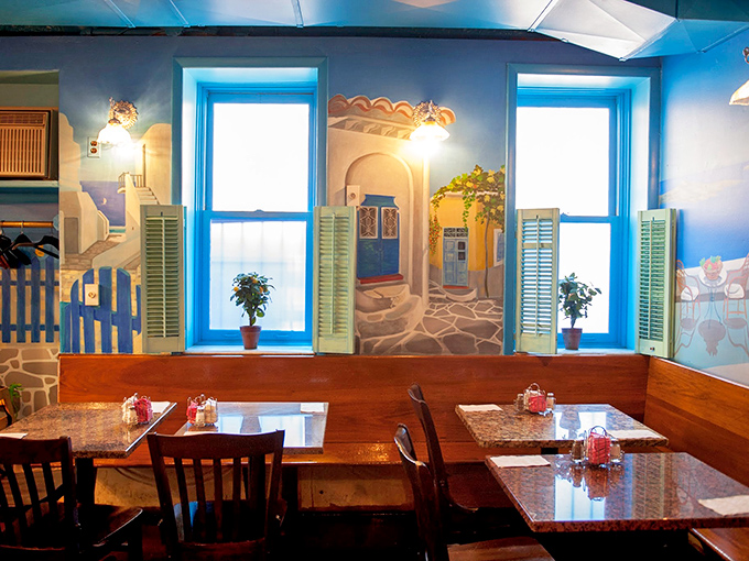 Dining beneath a mural of Greek coastal scenes &ndash; the closest thing to eating in Santorini without needing your passport or dealing with airport security.