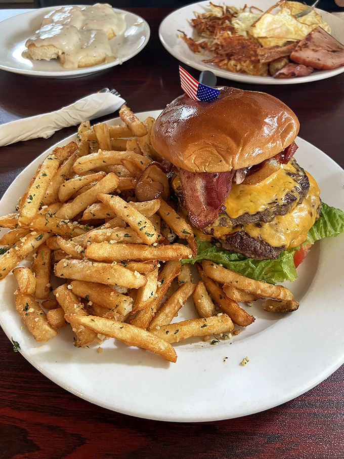 Behold the burger of your dreams&mdash;juicy patty, melted cheese, crispy bacon, and golden fries that deserve their own fan club.