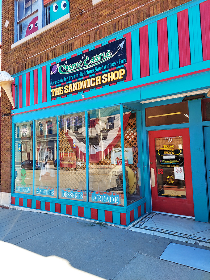 Cosmic Castle's vibrant storefront brings whimsy to Main Street. Ice cream tastes sweeter when you're not calculating how many hours you worked to afford it.
