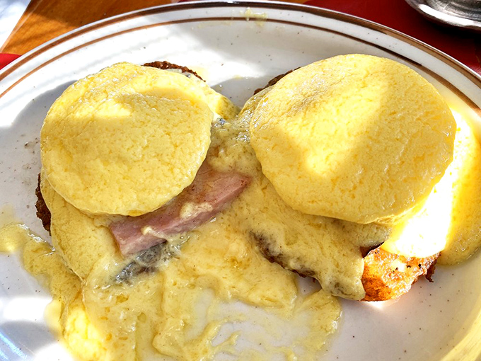 Eggs Benedict that makes hollandaise sauce look like liquid sunshine. Those English muffins are merely vehicles for delivering this golden goodness.