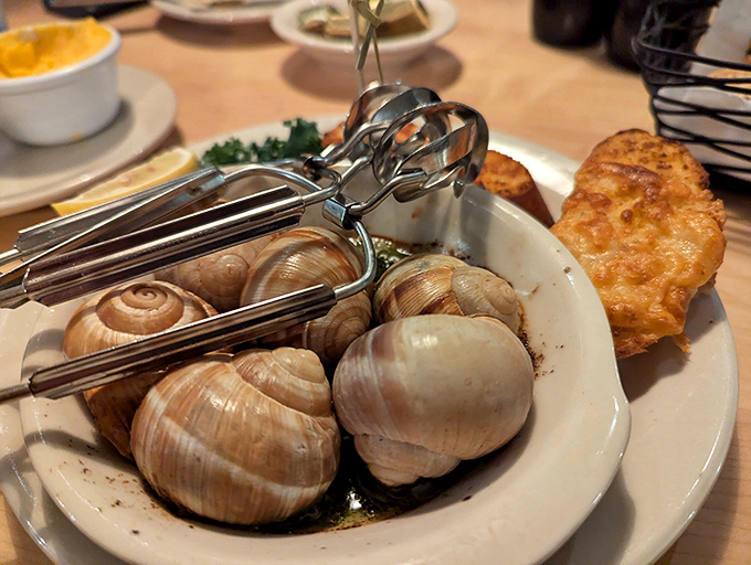 Escargot: Where butter, garlic, and patience transform an unlikely hero into the kind of appetizer worth crossing county lines for.