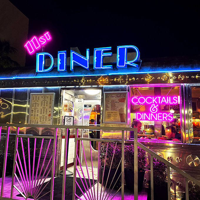 Electric dreams in neon blue—at night the diner glows like a scene from an '80s movie where something magical is about to happen.
