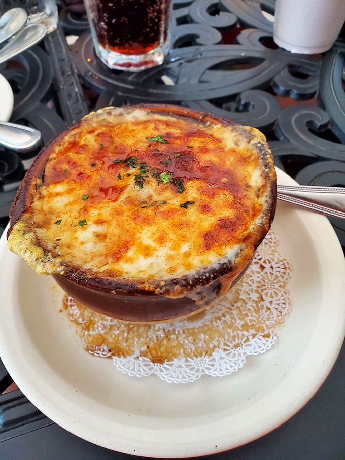This French onion soup, with its molten cheese cap, is like wearing a delicious sweater on the inside. 