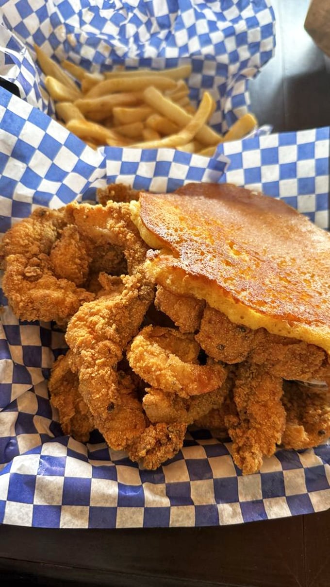 Fried catfish and cornbread with fries&mdash;the holy trinity of comfort that makes you wonder why you'd eat anything else.