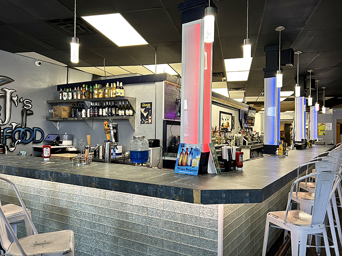 The bar area combines sleek design with soulful ambiance&mdash;a perfect stage for the culinary performance that happens behind the scenes.