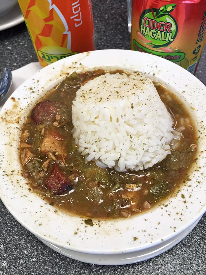 Louisiana meets Lower East Side in this hearty gumbo. White rice island surrounded by savory stew that bridges cultural divides deliciously.