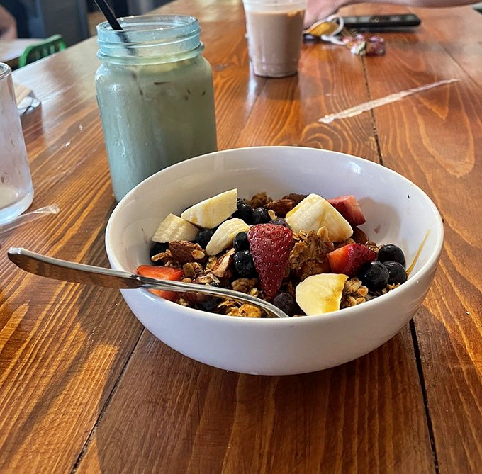 House-made granola with fresh fruit&mdash;breakfast's answer to jewelry. Each spoonful is like a little collection of edible gems.