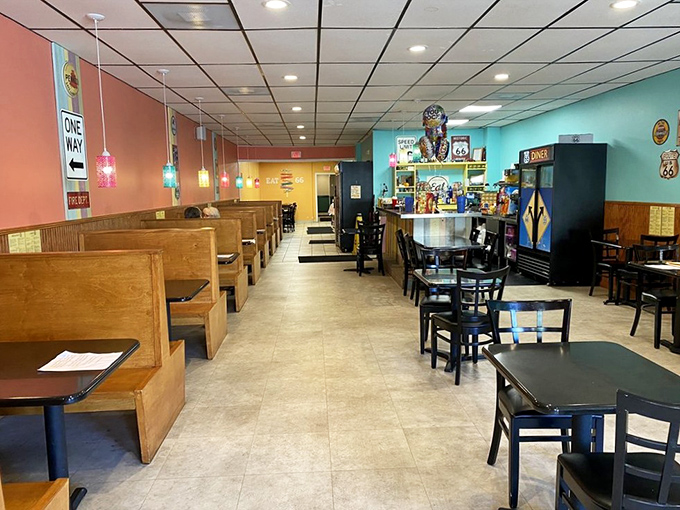 Route 66 memorabilia adorns sunshine-yellow walls, creating an atmosphere that's part museum, part time machine, all comfort.