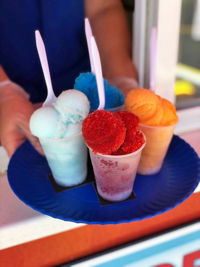 The layered parfait effect&mdash;red Italian ice and soft serve creating a dessert that's both refreshing and indulgent. Summer in a cup.