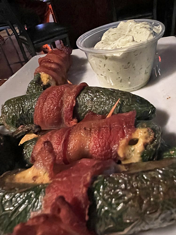 Green chile poppers wrapped in bacon &ndash; proving that when New Mexico ingredients meet pub fare, the results are nothing short of otherworldly.