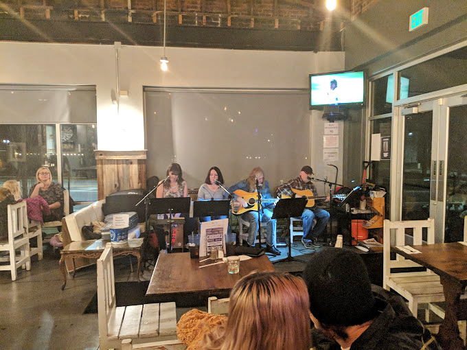 Live music nights transform this deli into a community gathering spot. Food for the stomach, music for the soul.