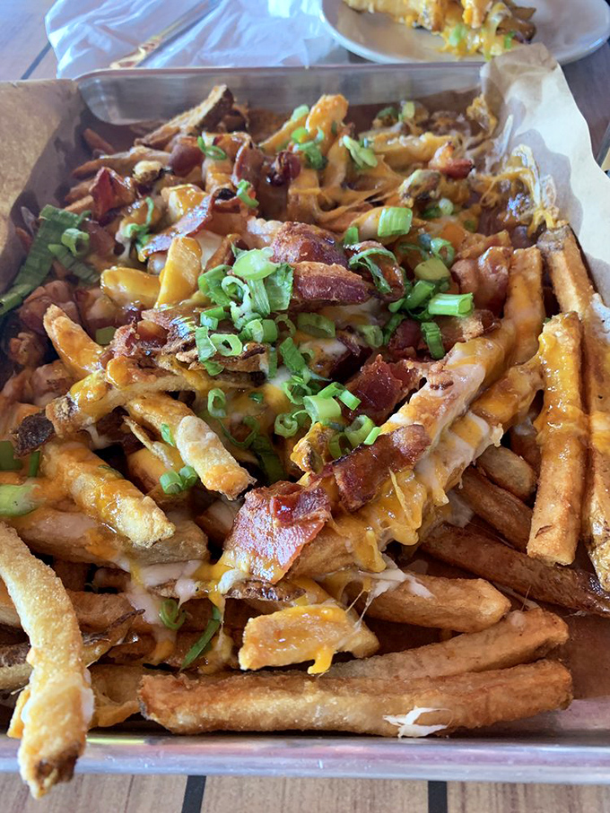 These loaded fries aren't just a side dish&mdash;they're a main event, a party, and possibly the reason stretchy pants were invented.