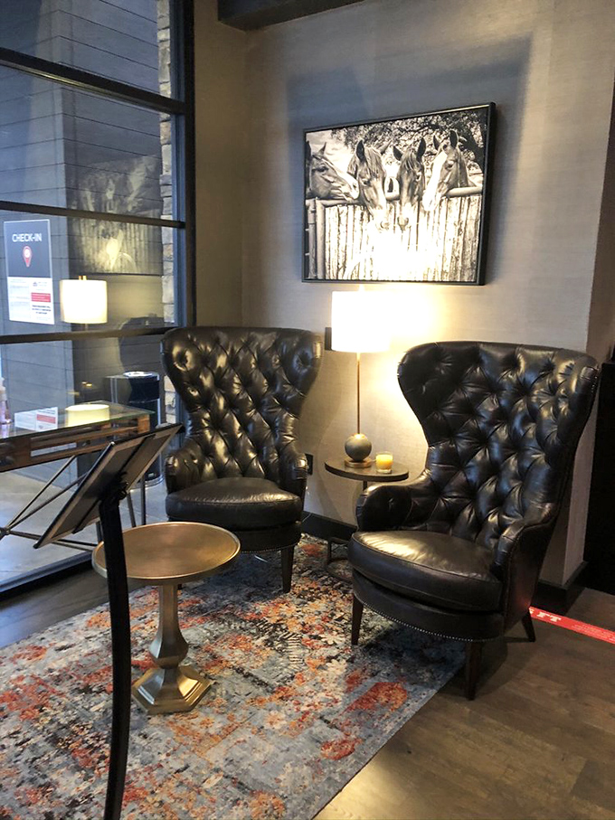 These leather wingback chairs aren't just seating&mdash;they're thrones for diners waiting to begin their culinary adventure.