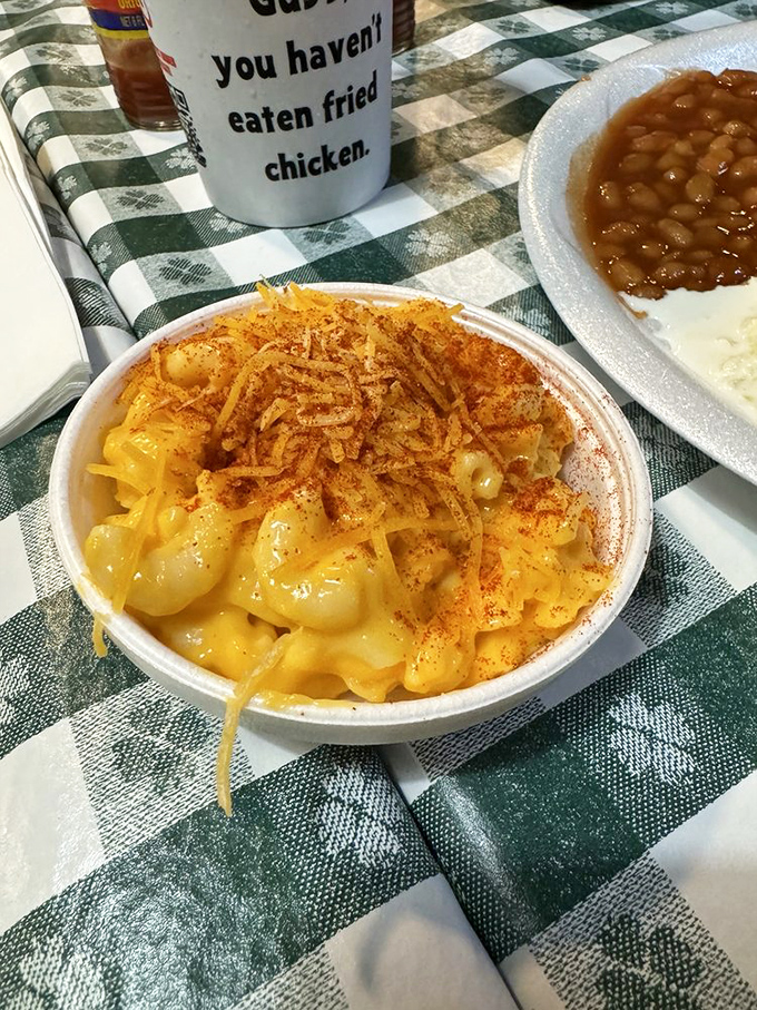 Mac & cheese topped with paprika and love&mdash;comfort food that's been elevated without getting fancy enough to forget its roots.